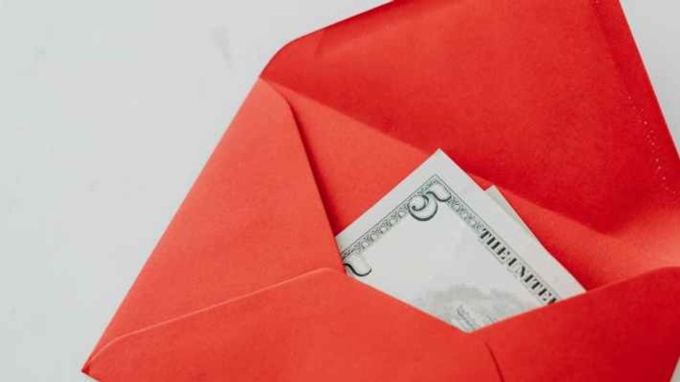 Teens Return the $50K Cash They Found Abandoned in Envelopes